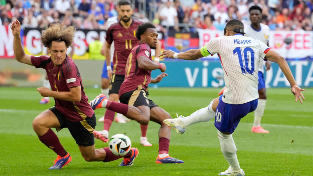 Late own goal gives France 1-0 win over tame Belgium
