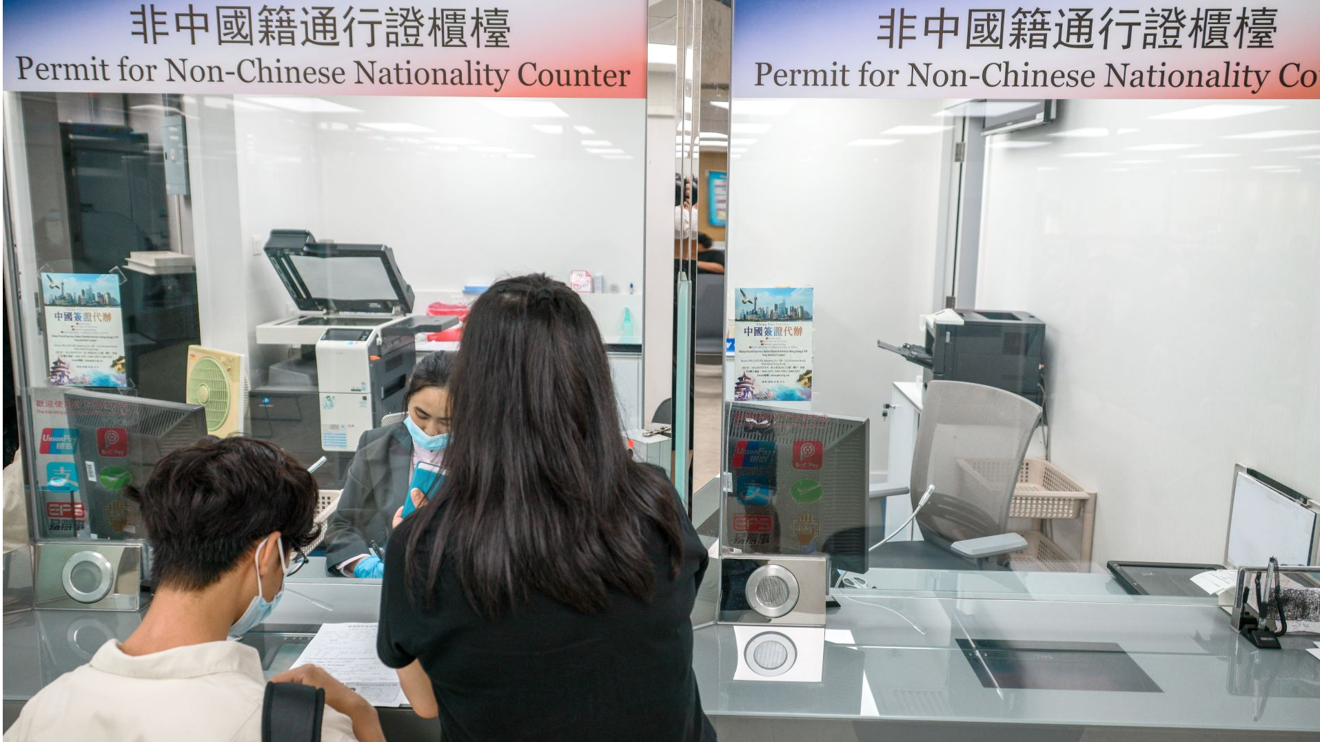 Expats hail new travel permit, but hope for clearer application guidelines