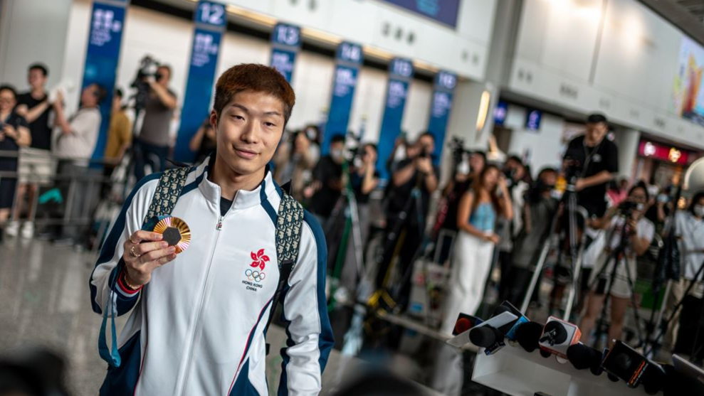 Hong Kong's fencing Olympian Cheung returns home to rapturous cheers