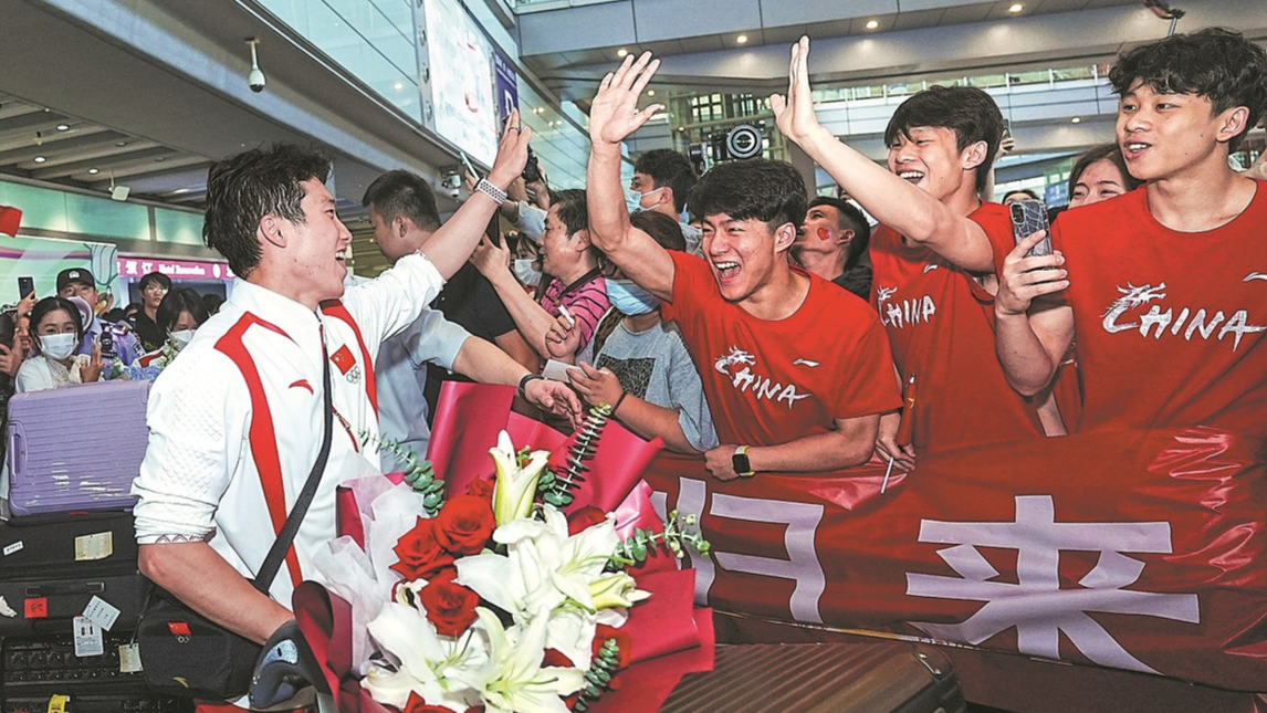 Team China hailed for Olympic wins, morale