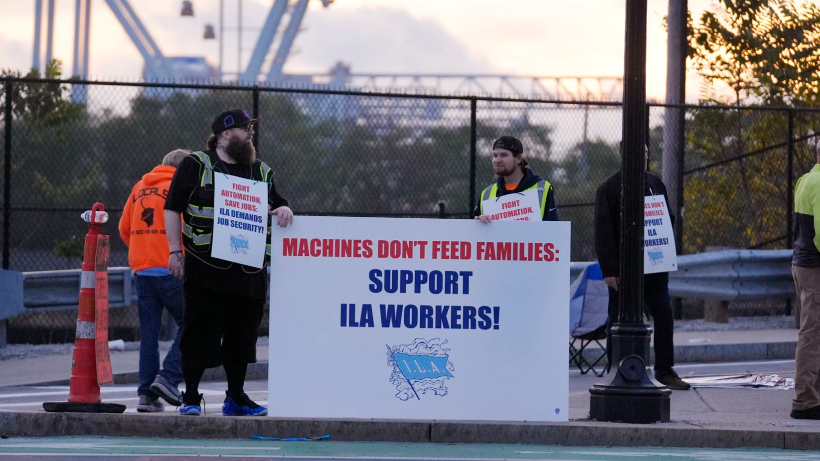 White House sides with union as dockworker strike enters second day