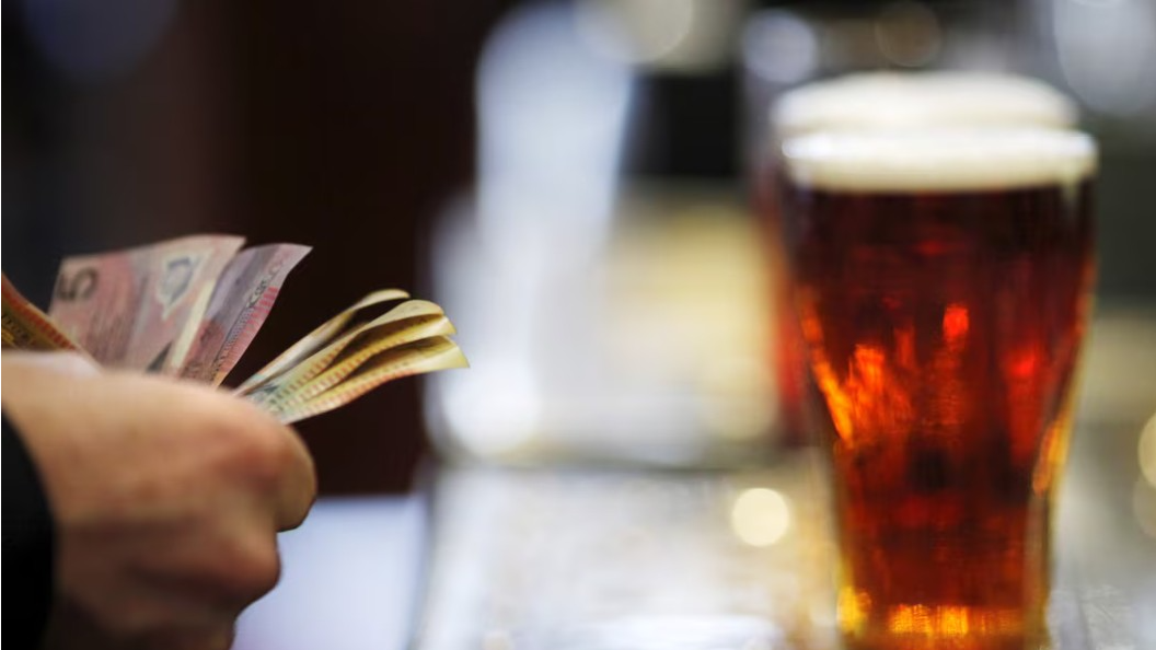 Australia govt pledges temporary beer tax freeze as election looms