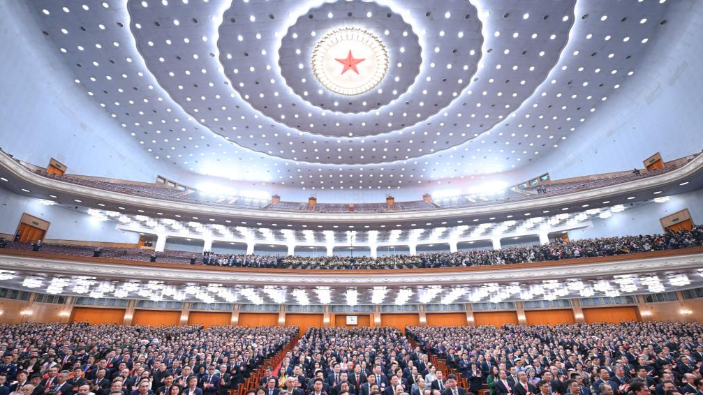 China's NPC holds closing meeting of annual session