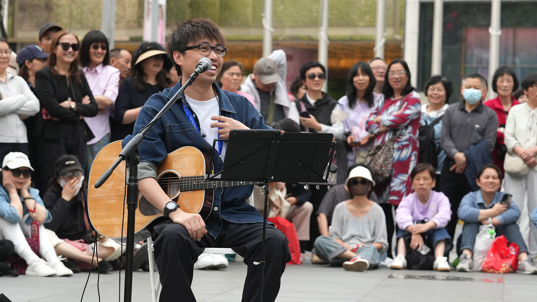 Street singer busks his way into hearts