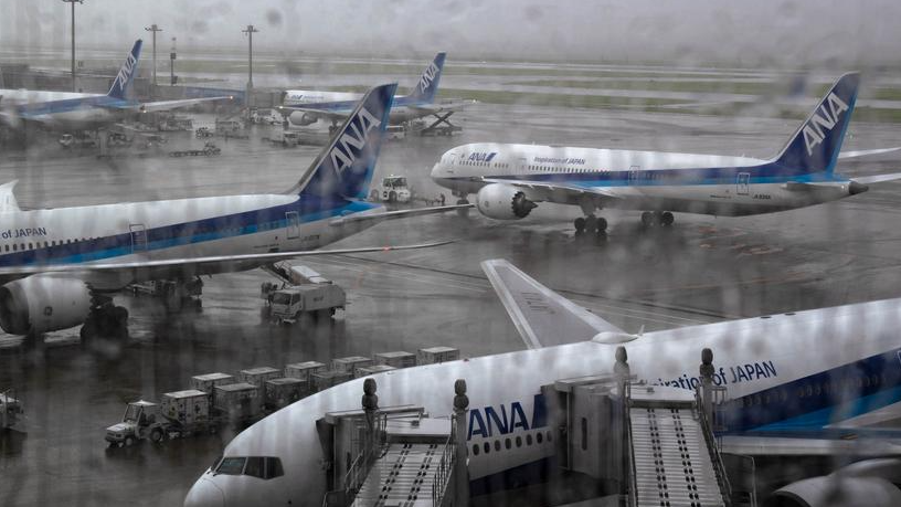 Fire near Tokyo's Haneda airport extinguished after delaying flights