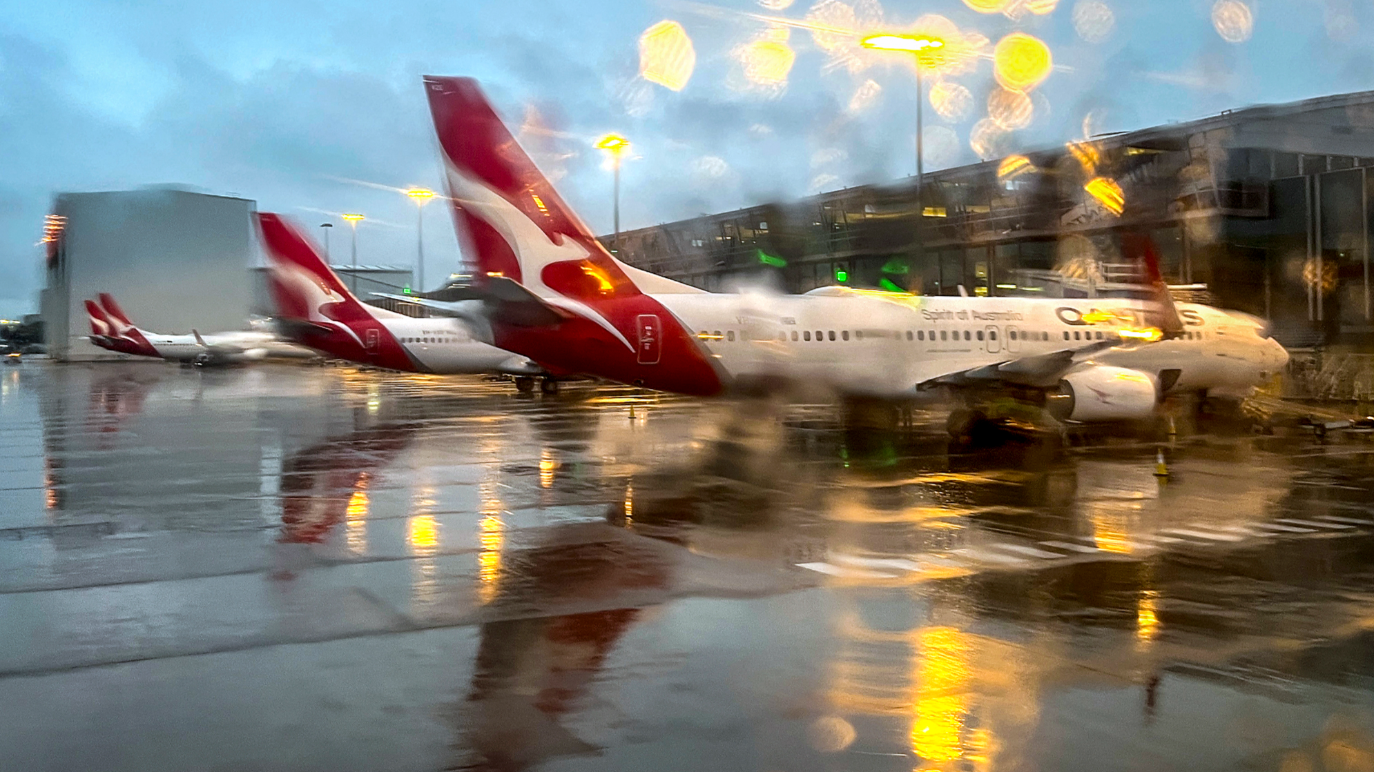 Qantas plane damaged in collision with aerobridge at Sydney Airport