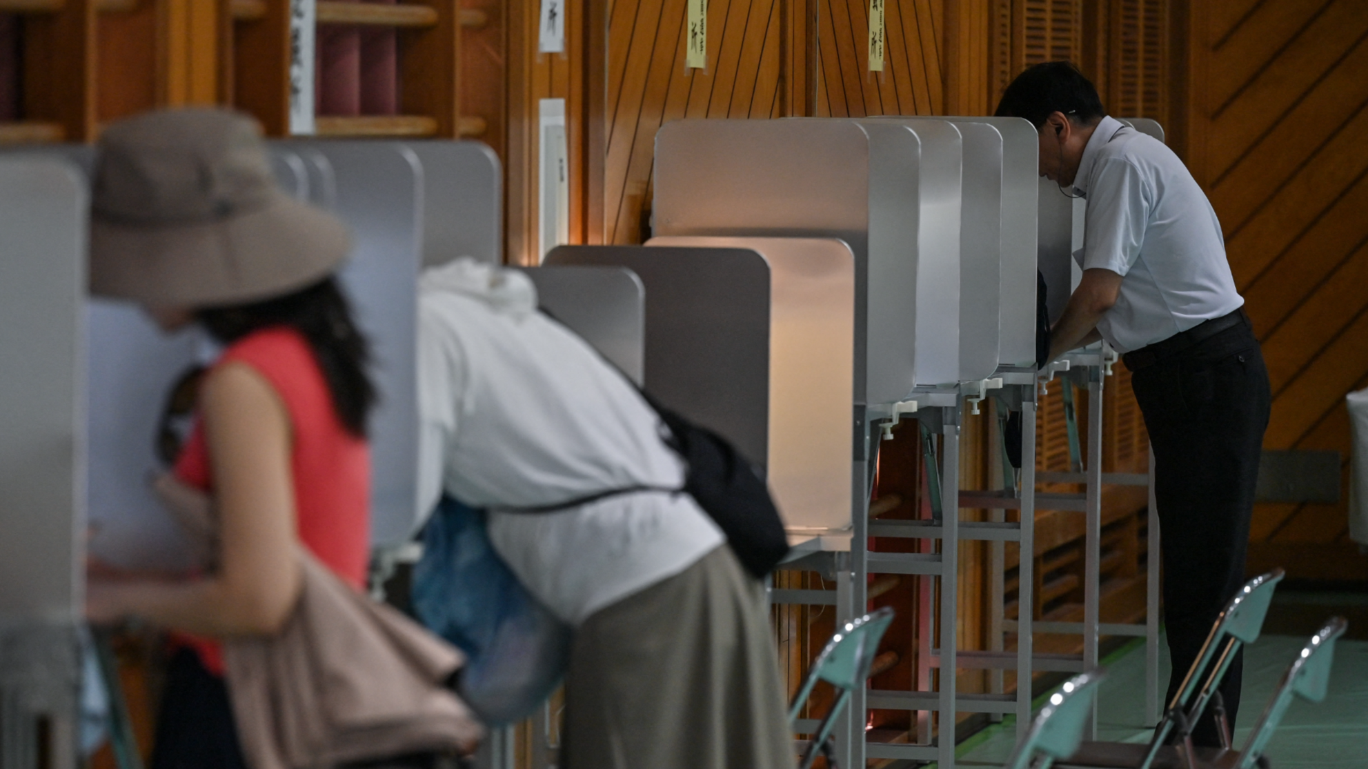 Voting starts in Japan elections as ruling bloc faces uphill battle