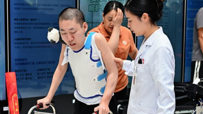 Surgery successful for man with folded spine