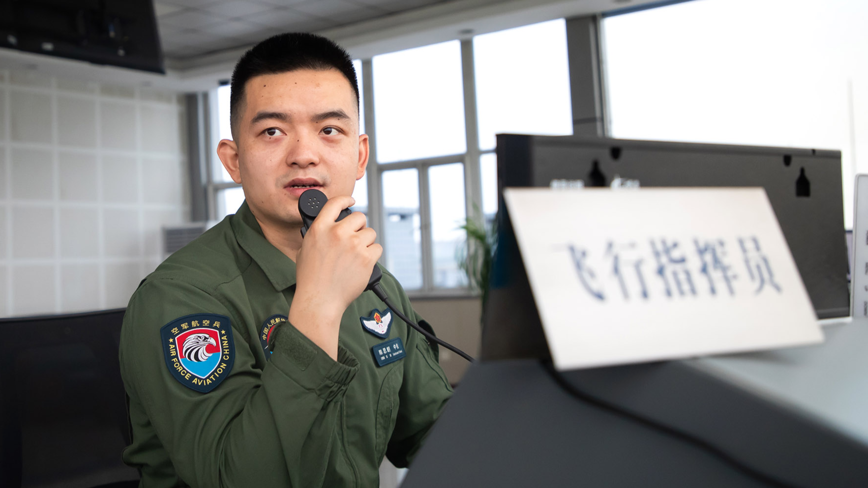 Transport aircraft pilot flies high in PLA