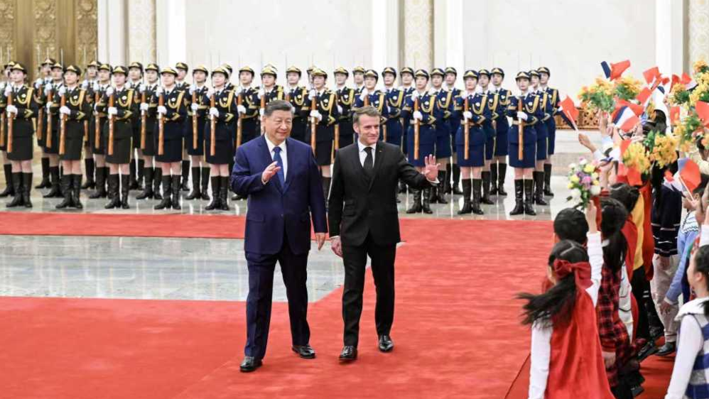 Xi meets Macron, urges expanded cooperation in multiple areas